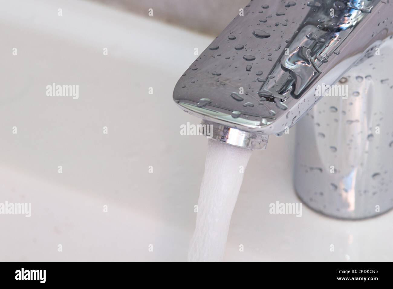 Water faucet. Water flow in the bathroom Modern clean house. hygiene ...