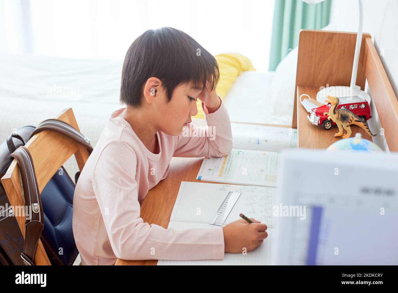 Japanese kid studying at home Stock Photo - Alamy