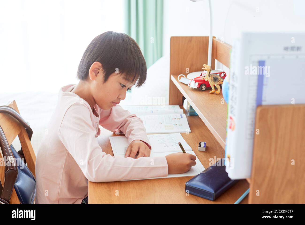 Japanese kid studying at home Stock Photo - Alamy