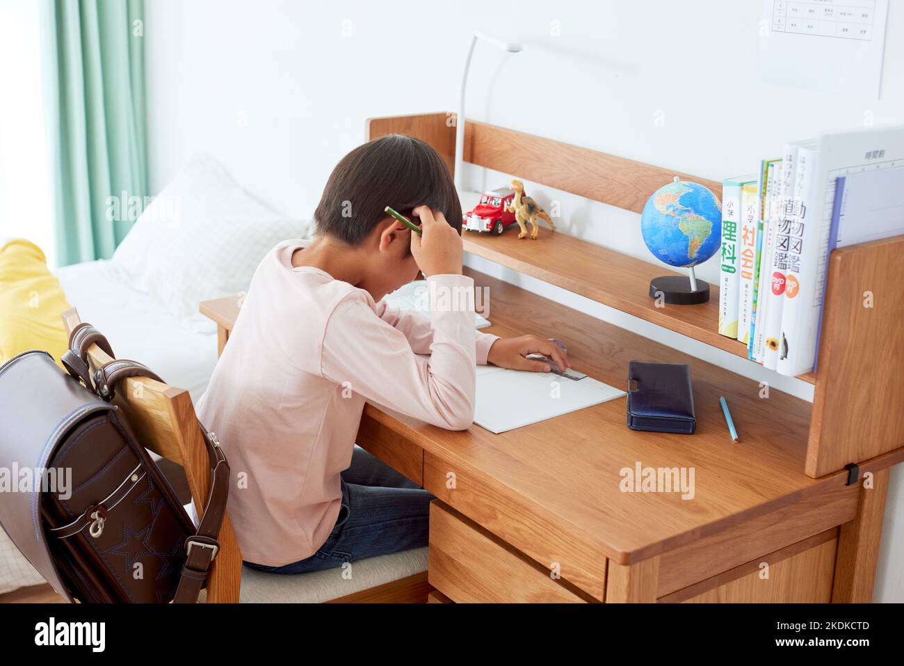 Japanese kid studying at home Stock Photo - Alamy