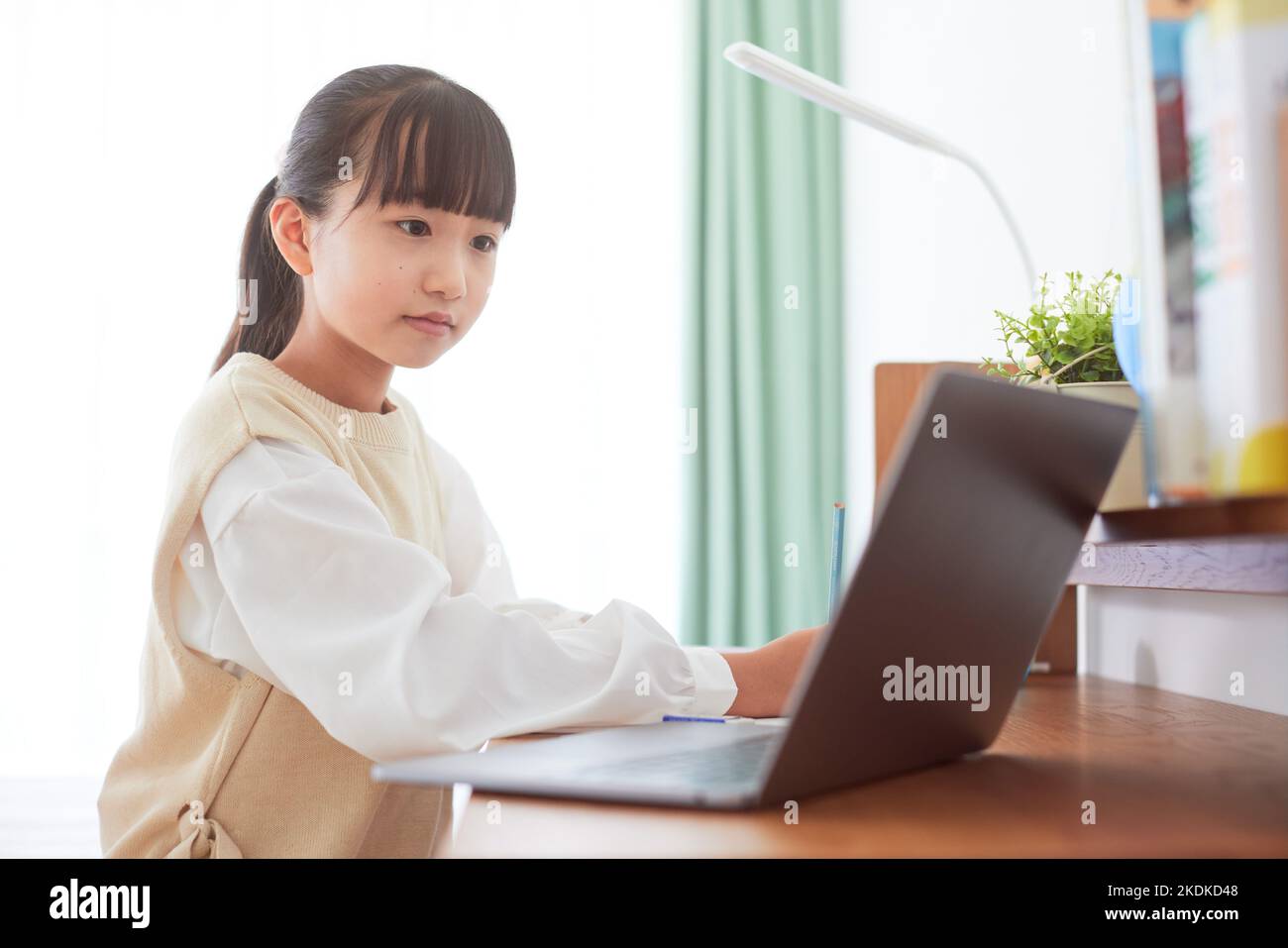 Japanese kid studying at home Stock Photo - Alamy