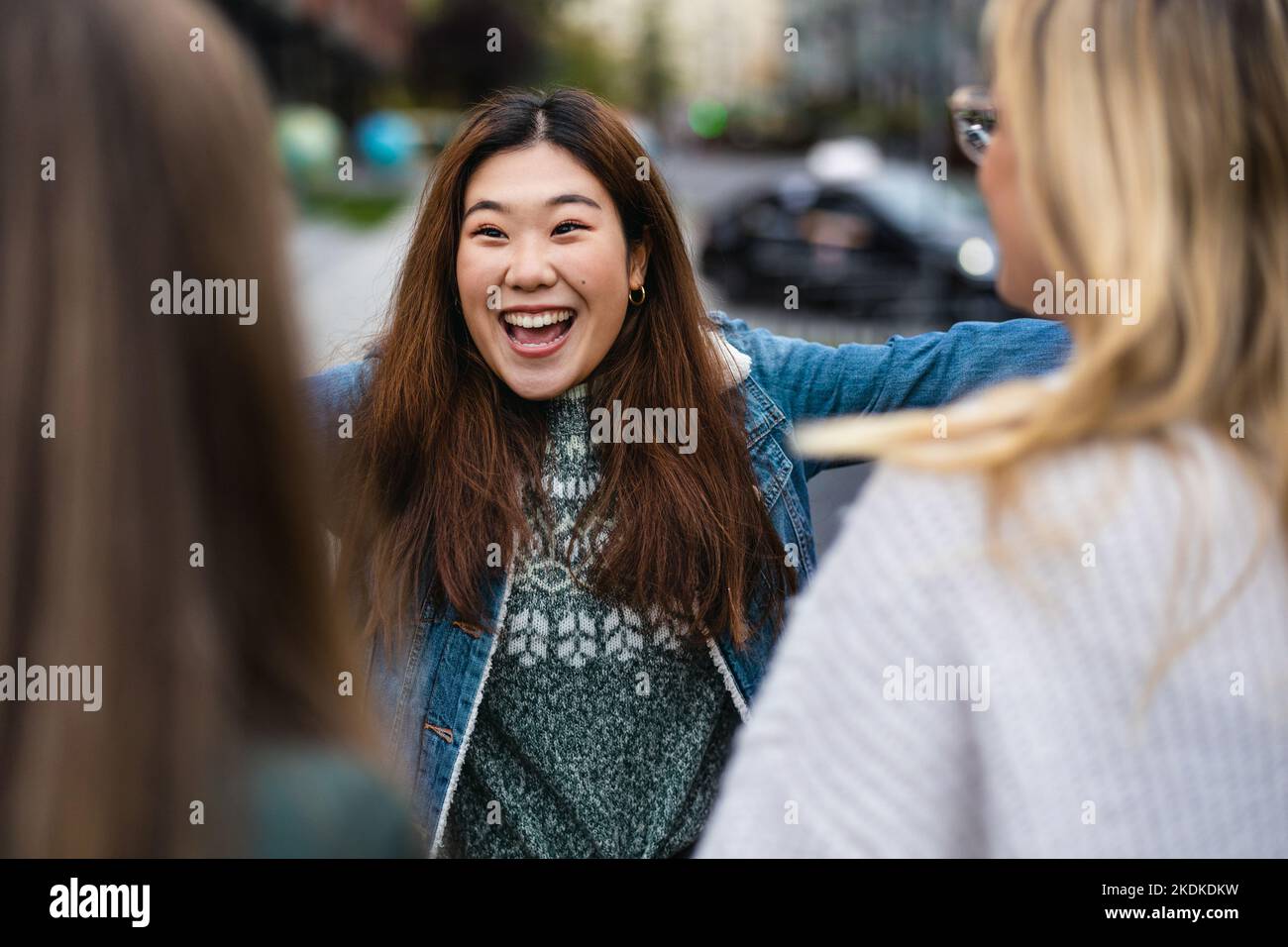 Best friends meeting in the street Stock Photo - Alamy