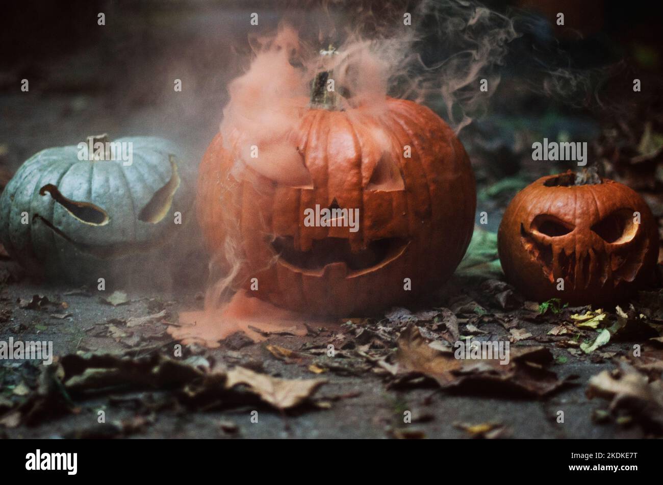 Carved jack-o-lantern pumpkin with smoke coming out of it Stock Photo ...
