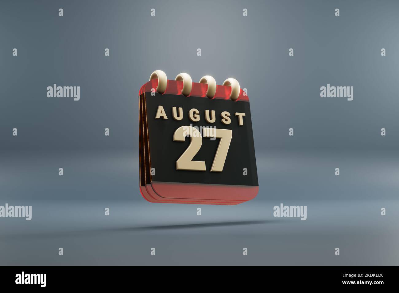 Standing black and red month lined desk calendar with date August 27 ...