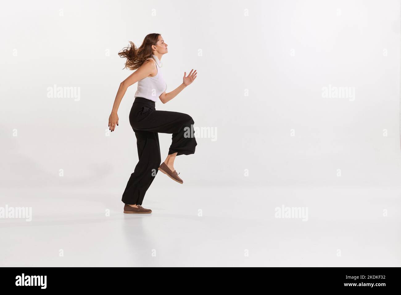 Portrait of young woman, employee stepping on imagination steps over ...