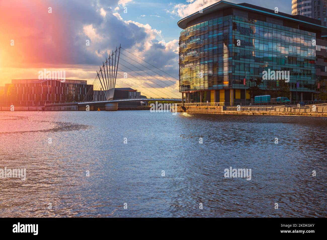 UK, England, Greater Manchester, Salford, Salford Quays during sunset ...