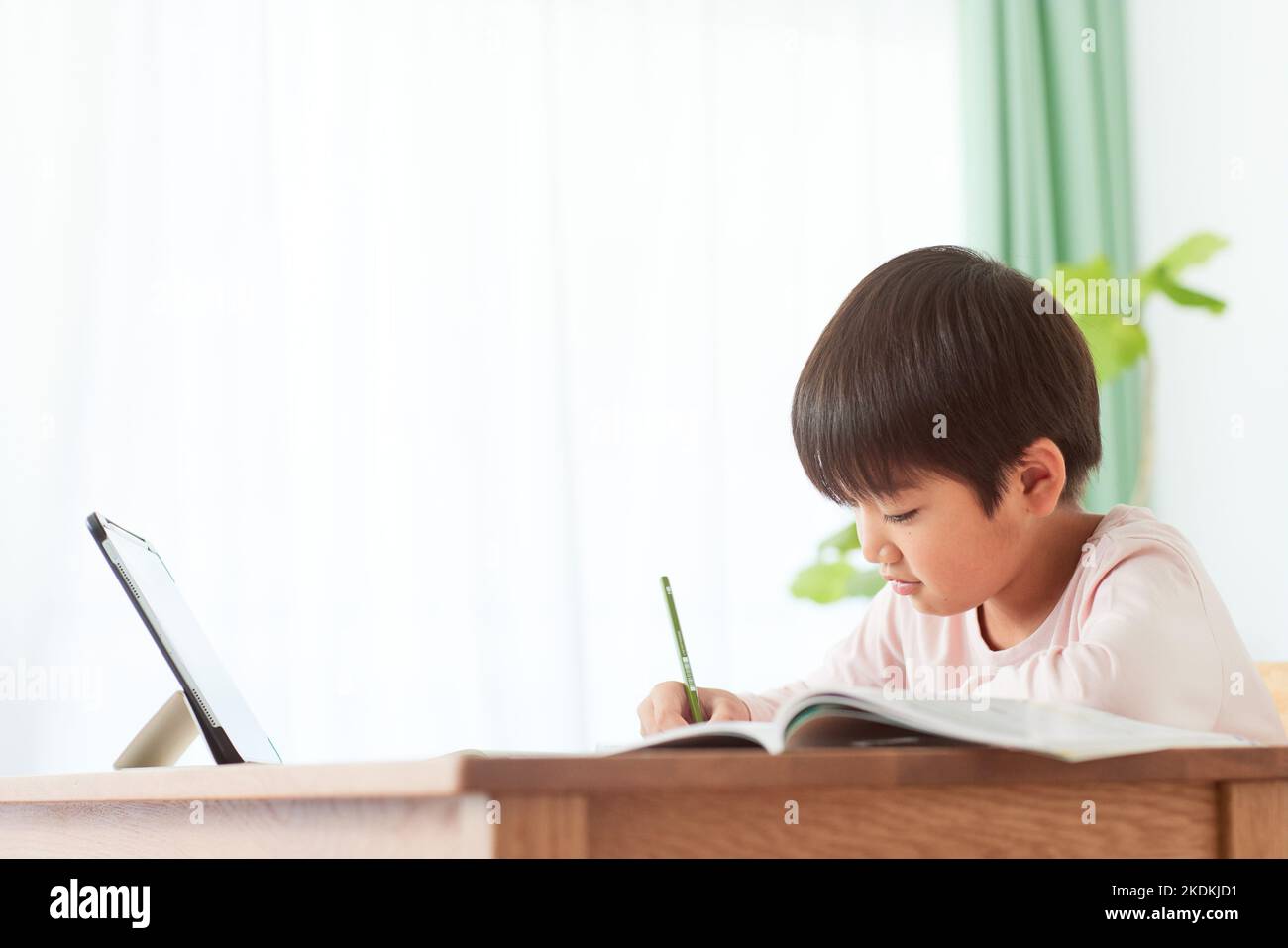 Japanese kid studying at home Stock Photo - Alamy