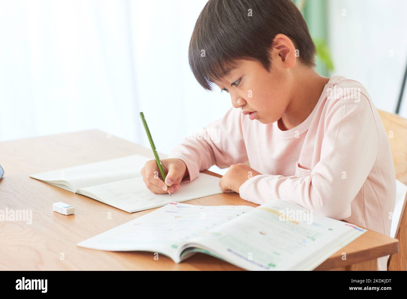 Japanese kid studying at home Stock Photo - Alamy