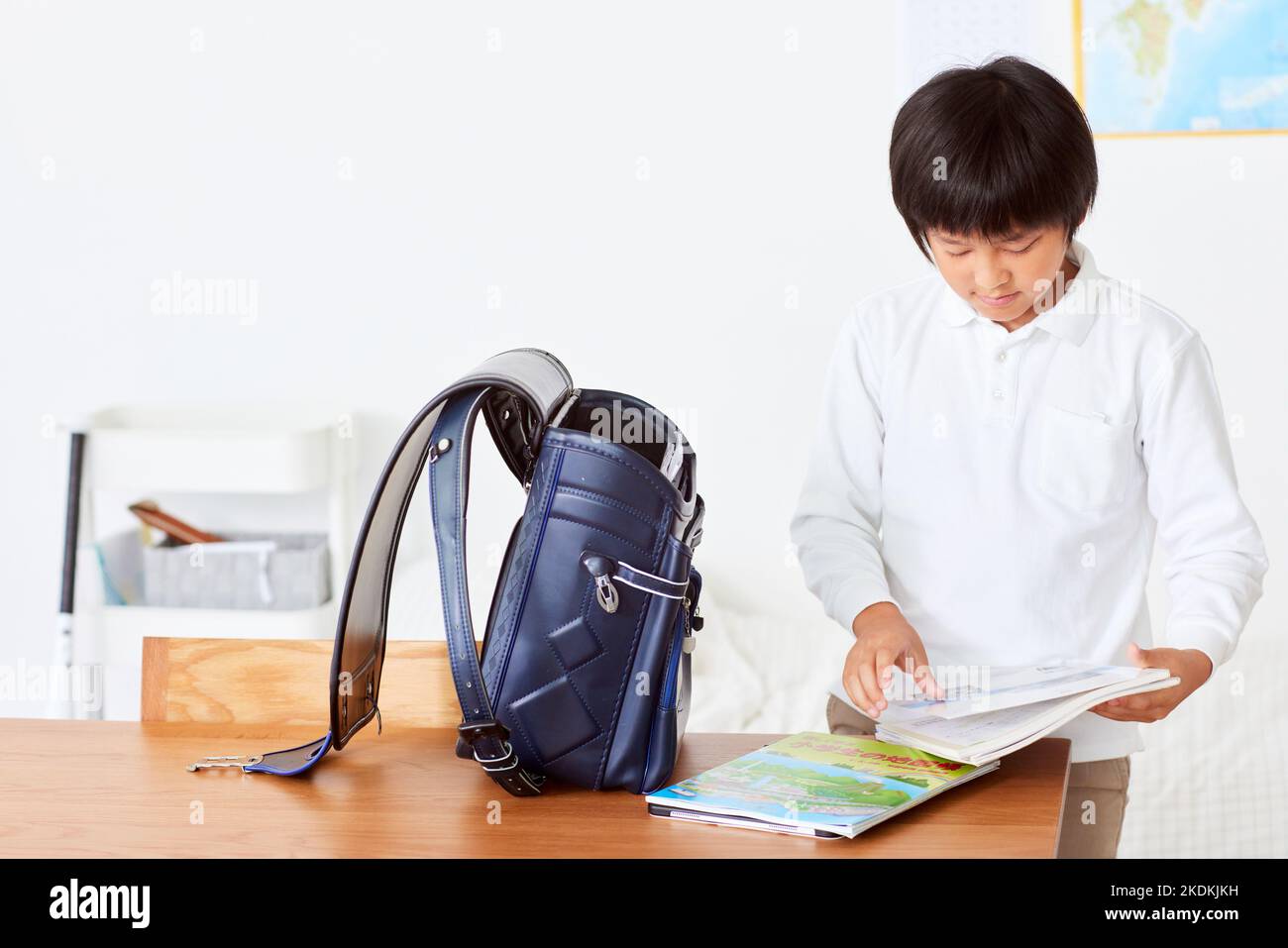 Japanese kid studying at home Stock Photo - Alamy