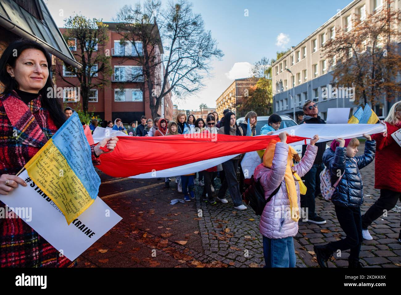 Kids seen holding a huge Polish flag during the march. The march of the ...