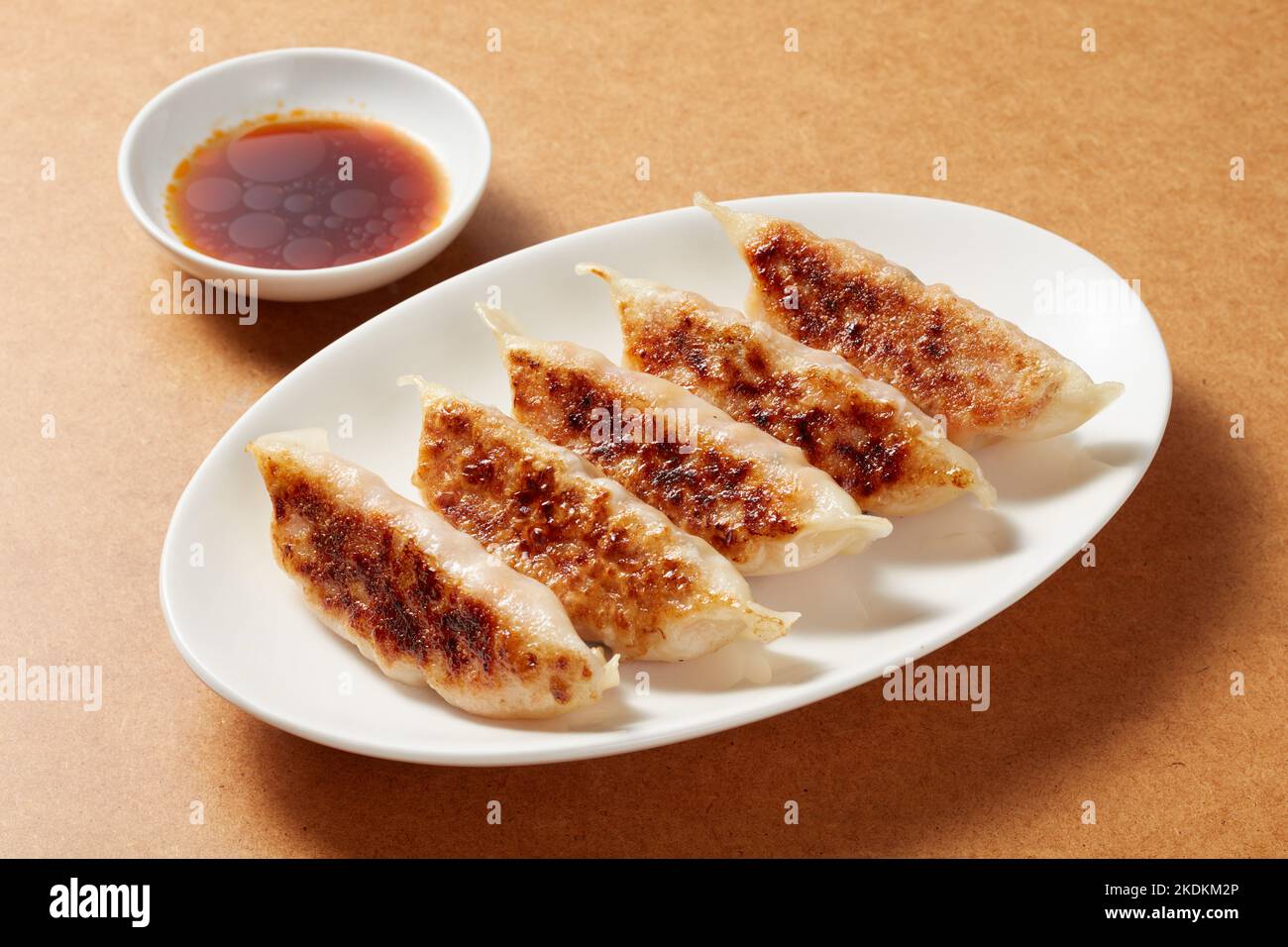 Plate fried chinese dumplings hi-res stock photography and images - Alamy