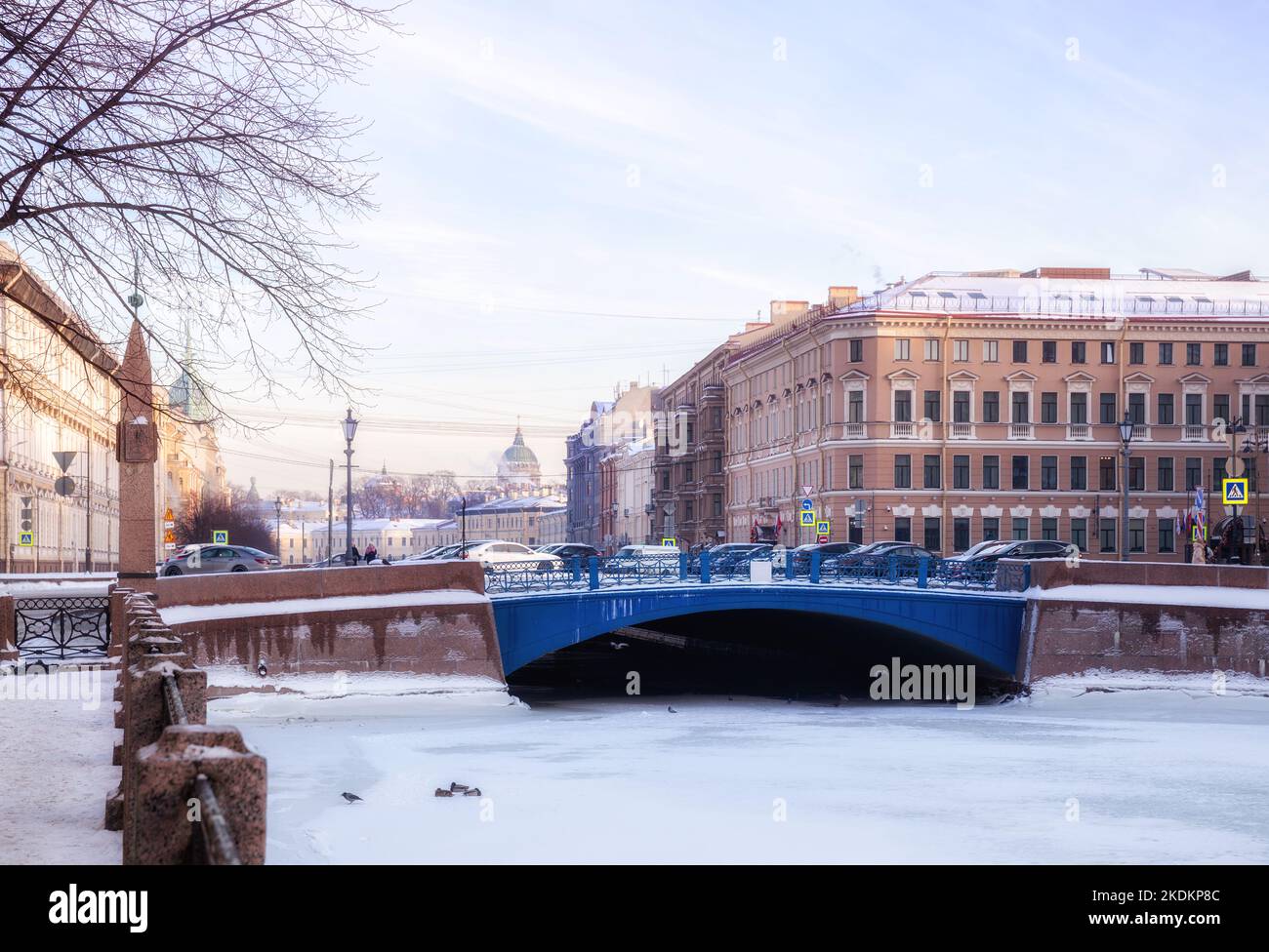 Winter Petersburg. Blue bridge and ancient buildings on the embankments ...