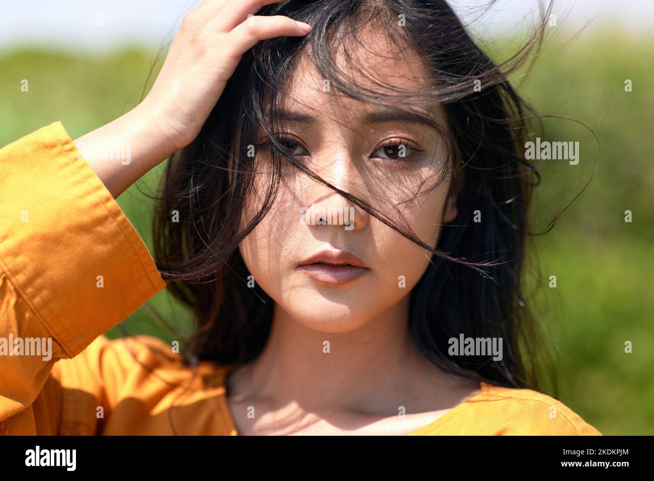 Asian face close up hi-res stock photography and images - Alamy