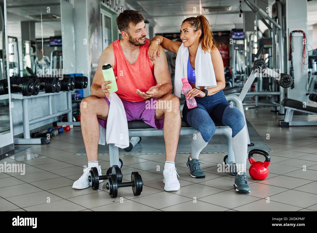 gym sport fitness couple exercise relaxing resting training fit workout ...