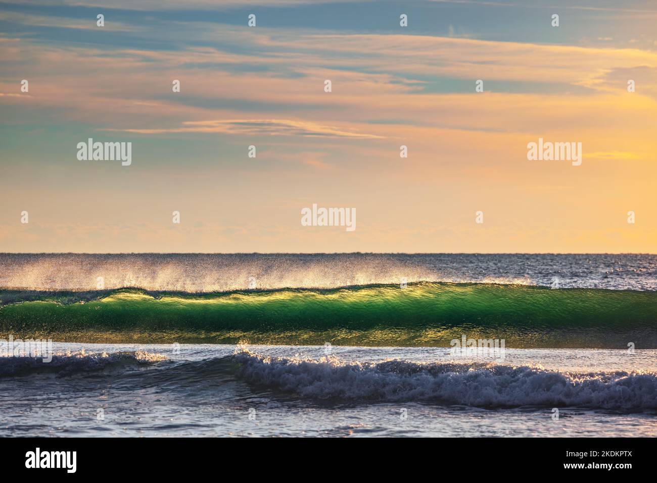 Beautiful beach sunset rolling waves hi-res stock photography and ...