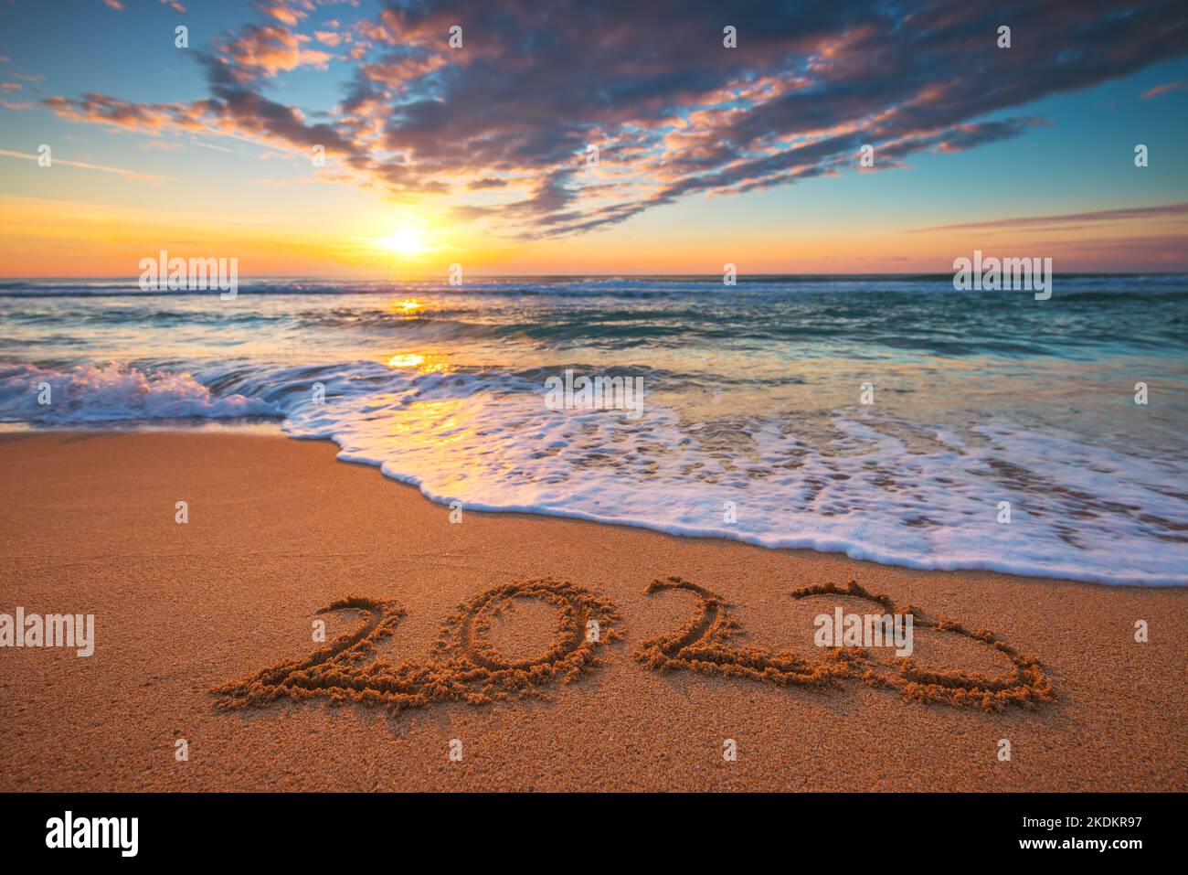 Happy New Year 2023 concept, lettering on the beach. Written text on ...