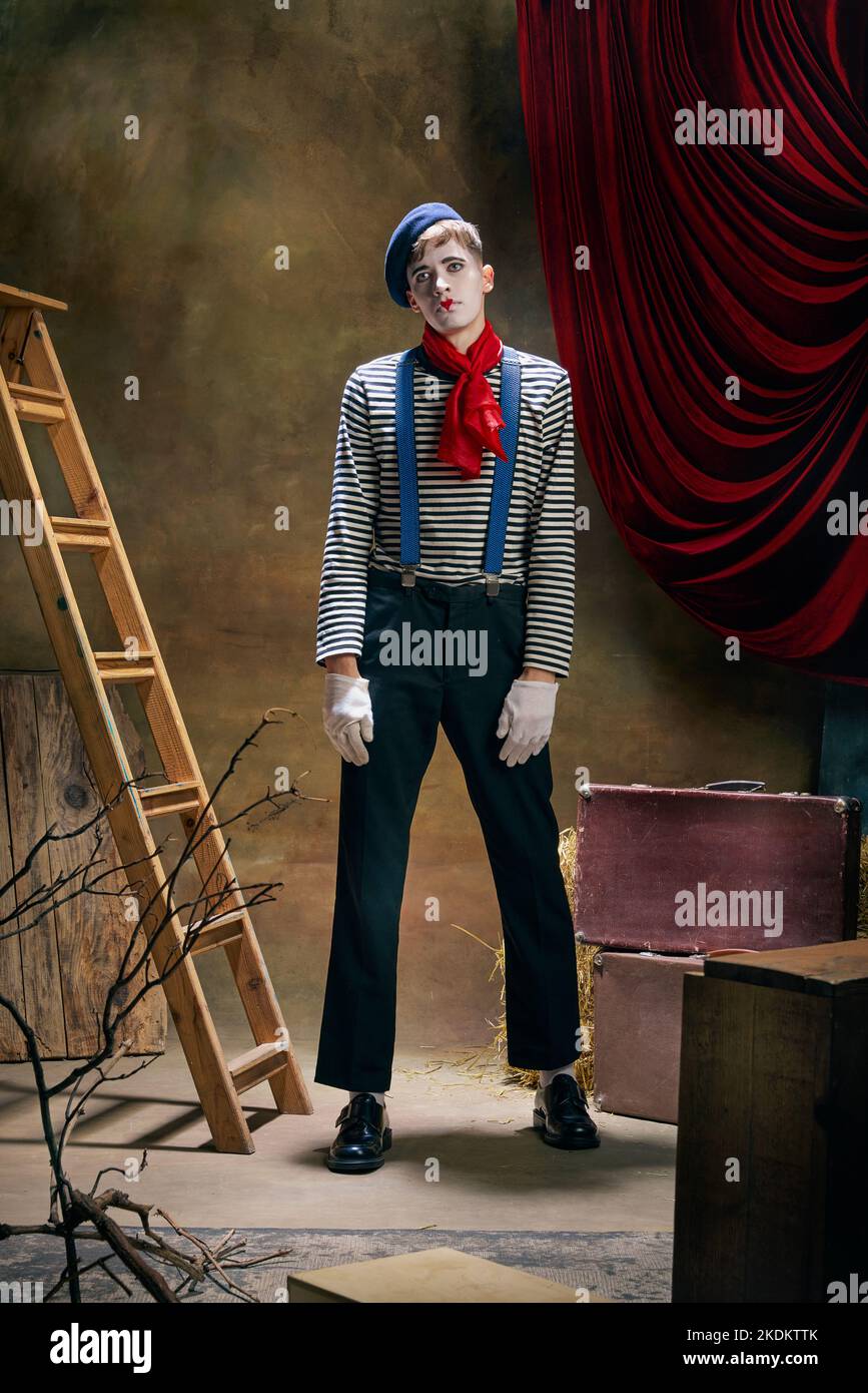 Vintage portrait of male mime artist expressing sadness and loneliness ...