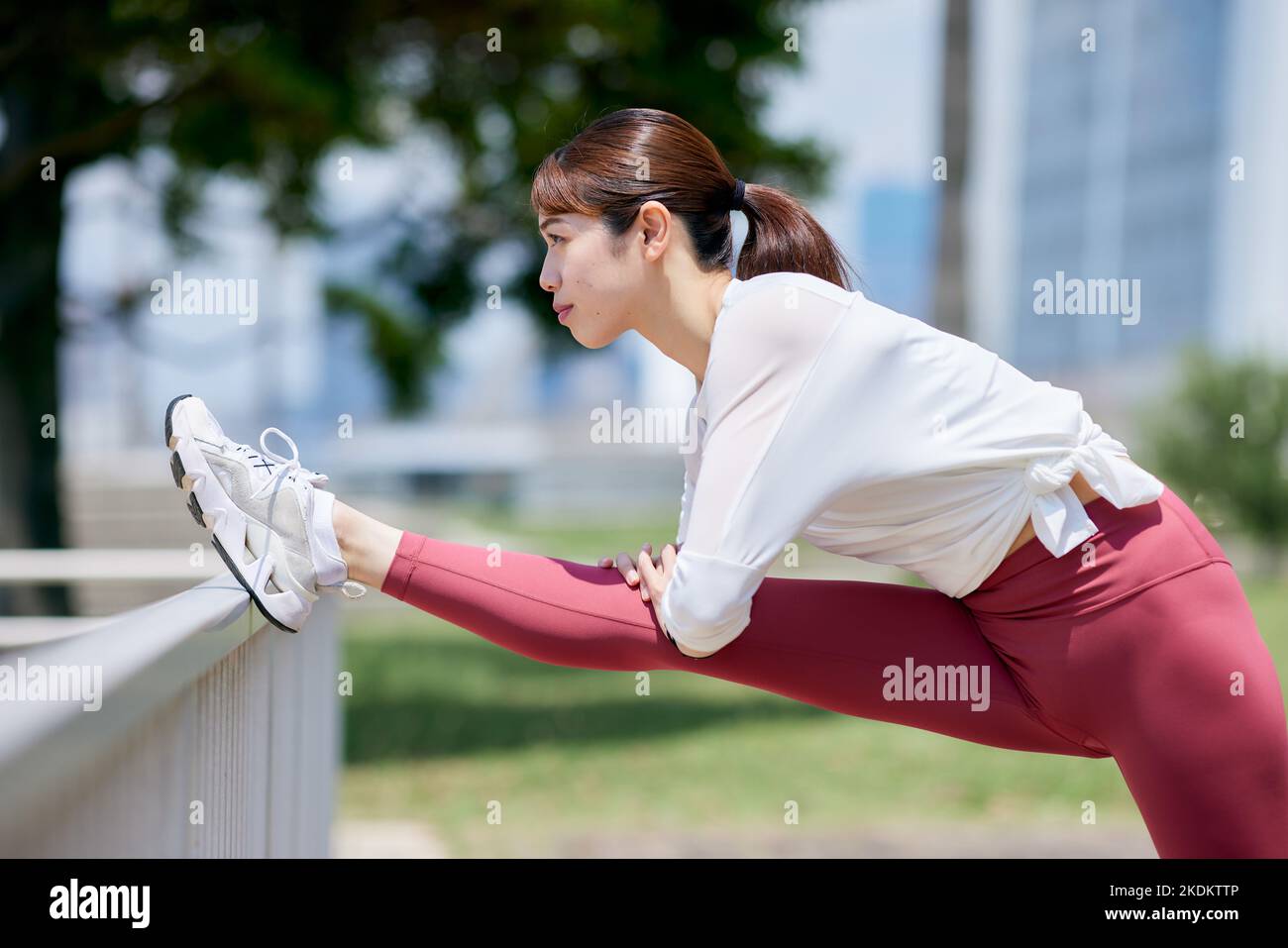 Young Japanese training downtown Stock Photo - Alamy