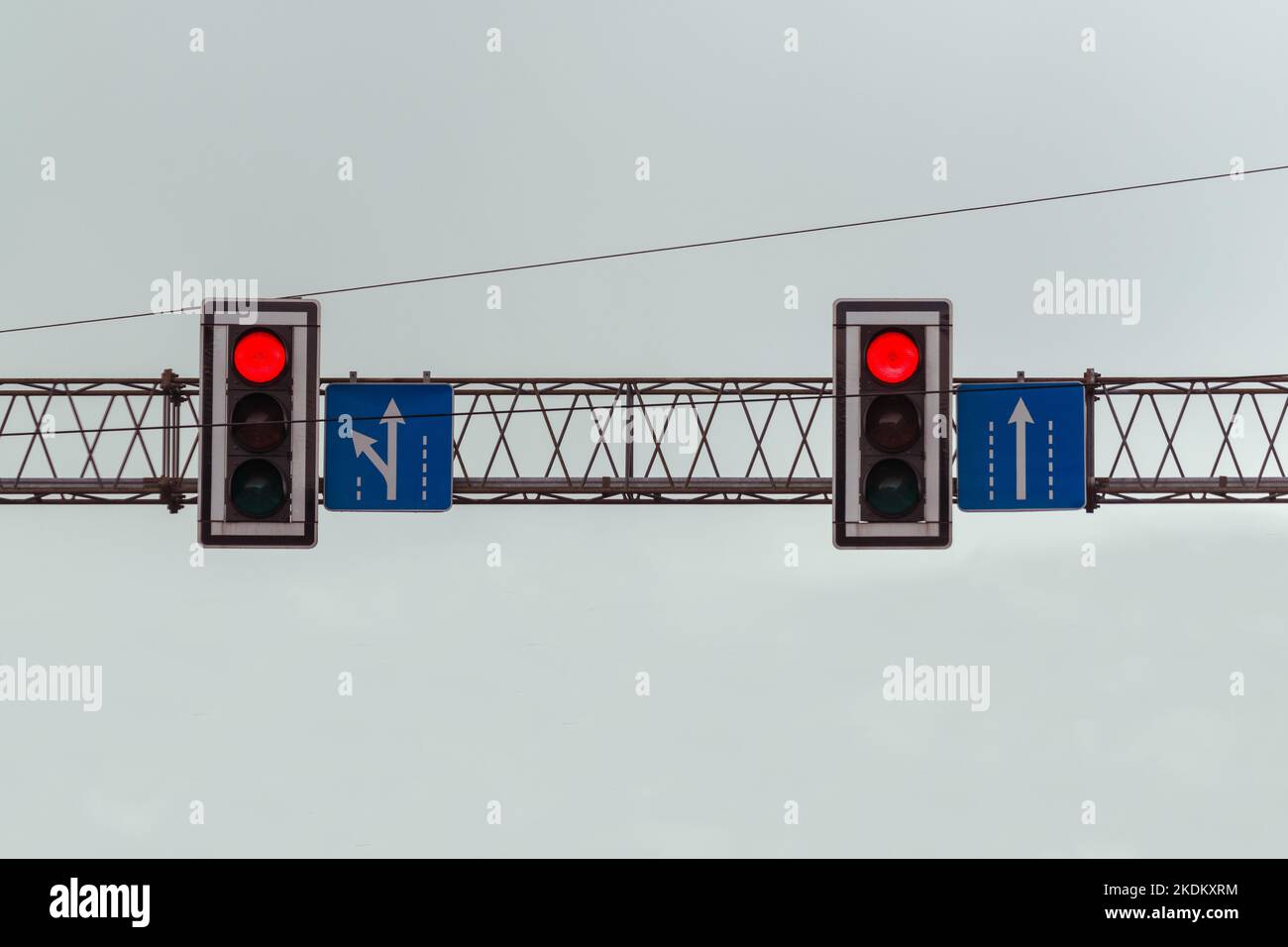 Traffic lights over the city crossroads. Traffic lights over blue sky ...