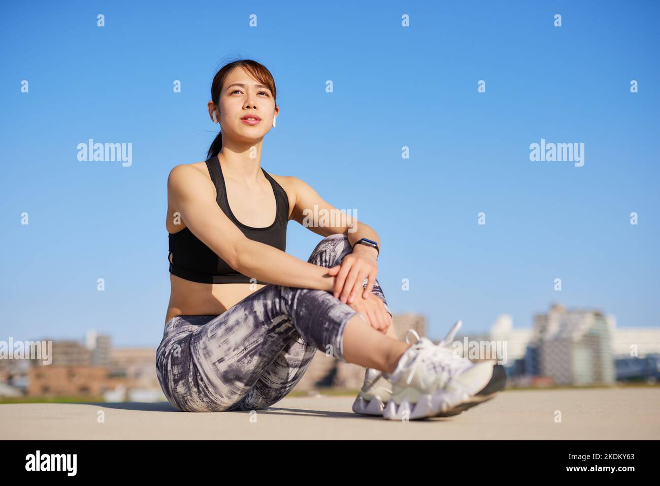 Young Japanese training downtown Stock Photo - Alamy