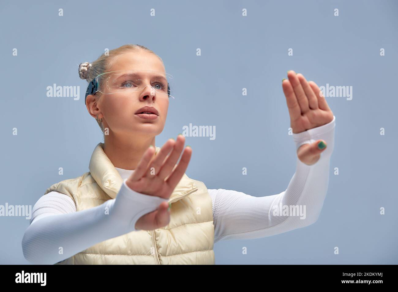 Smart glasses and augmented reality concept. Woman wearing modern ...