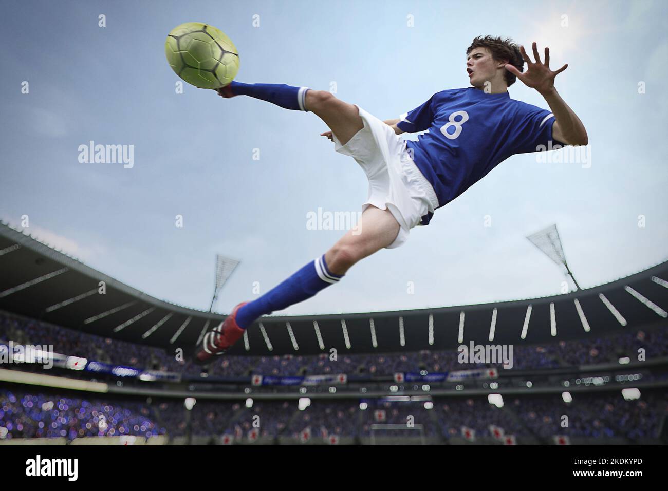 Soccer player hitting the ball Stock Photo - Alamy