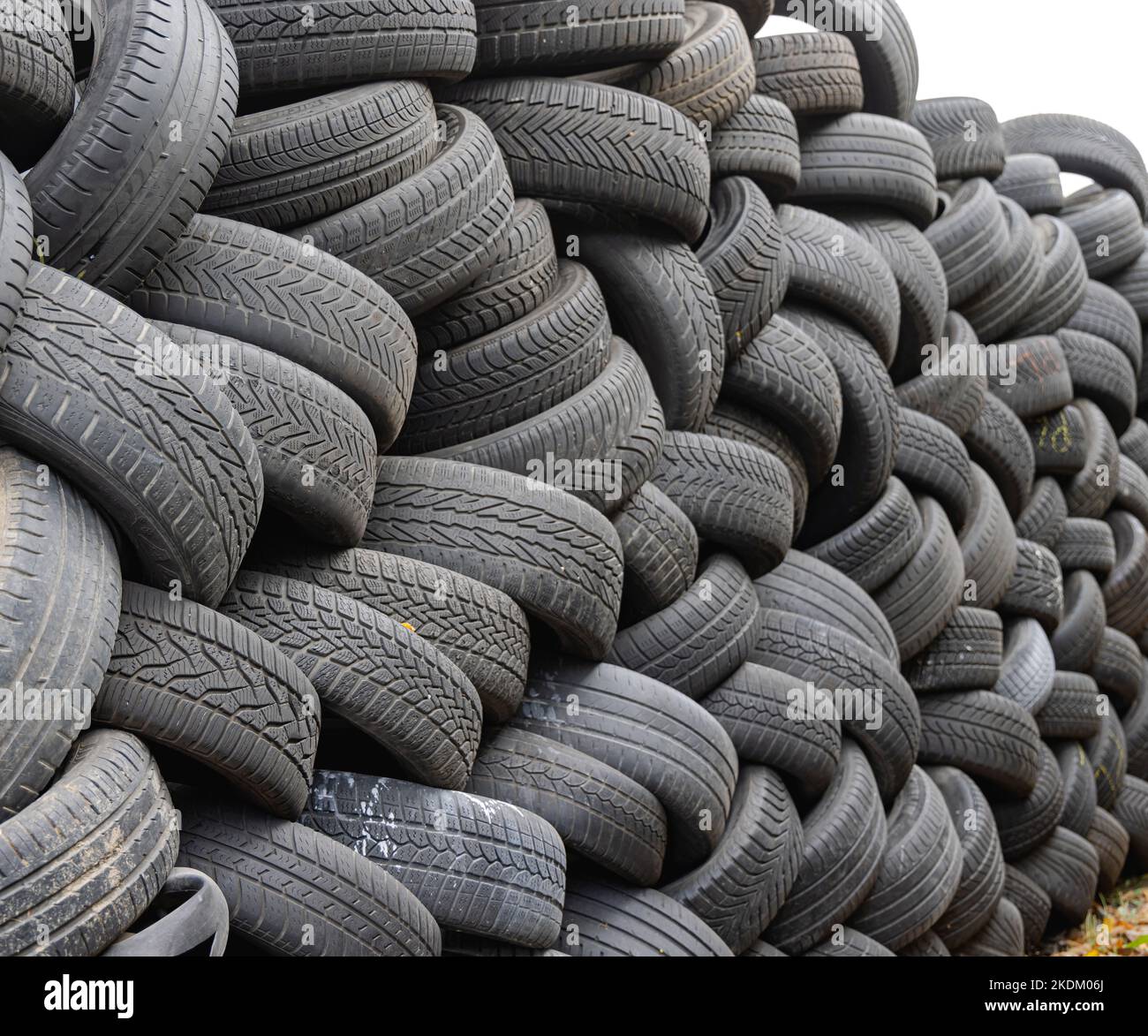 Assorted Used Automotive Road Tires Showing Variety of Tread Patterns ...