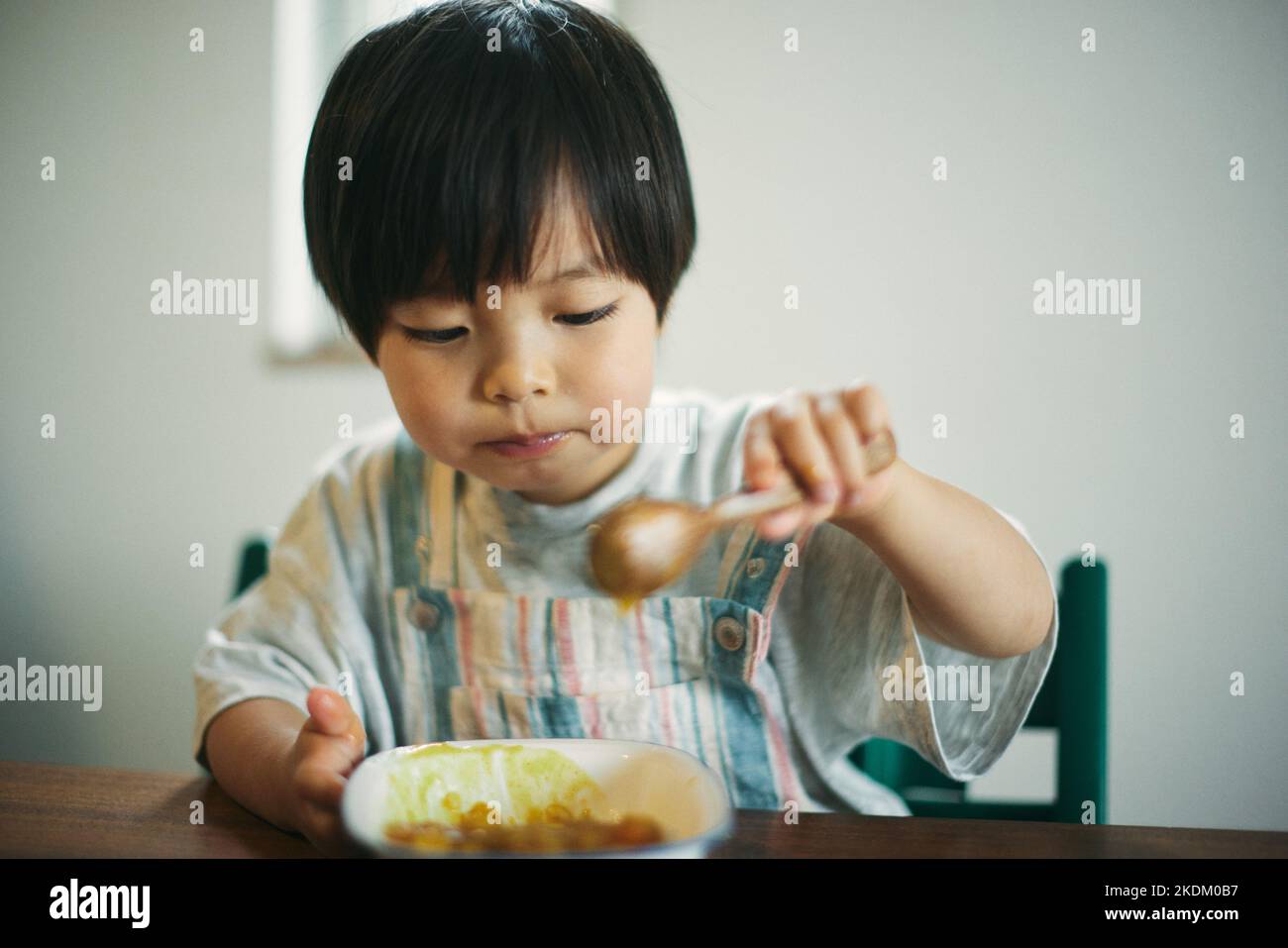 Japanese kid at eating at home Stock Photo - Alamy