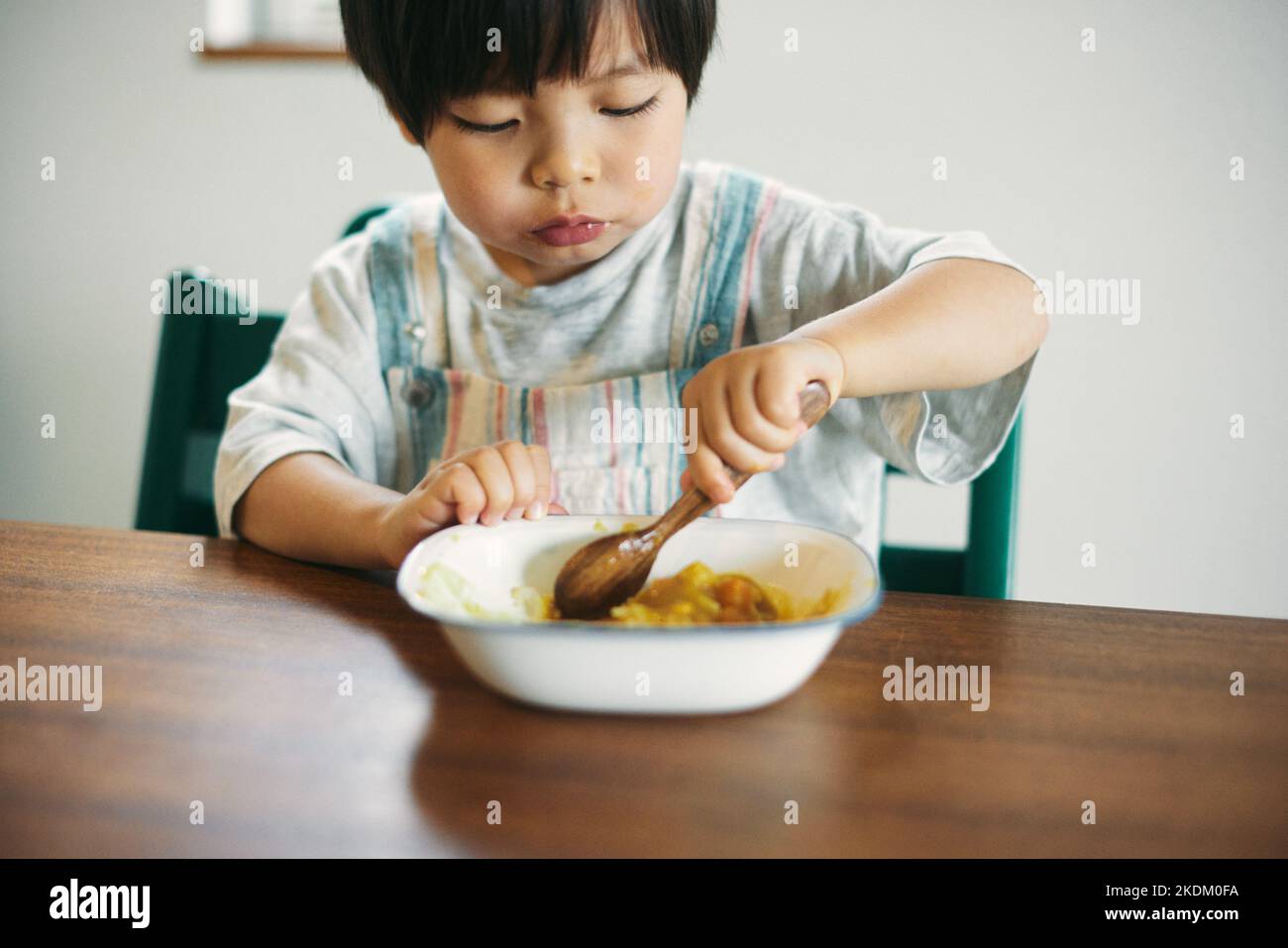 Japanese kid at eating at home Stock Photo - Alamy