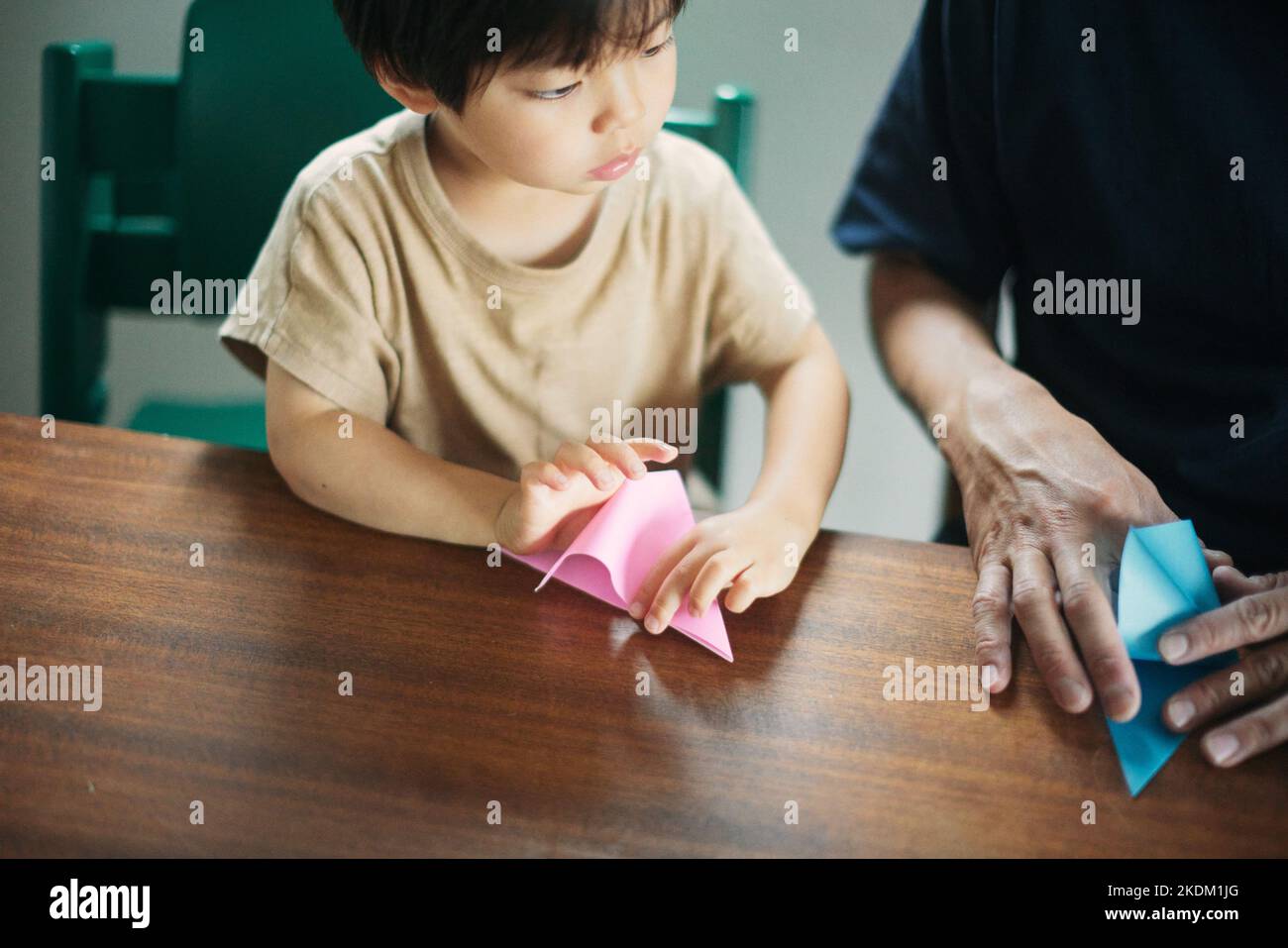 Japanese kid playing with his dad at home Stock Photo - Alamy