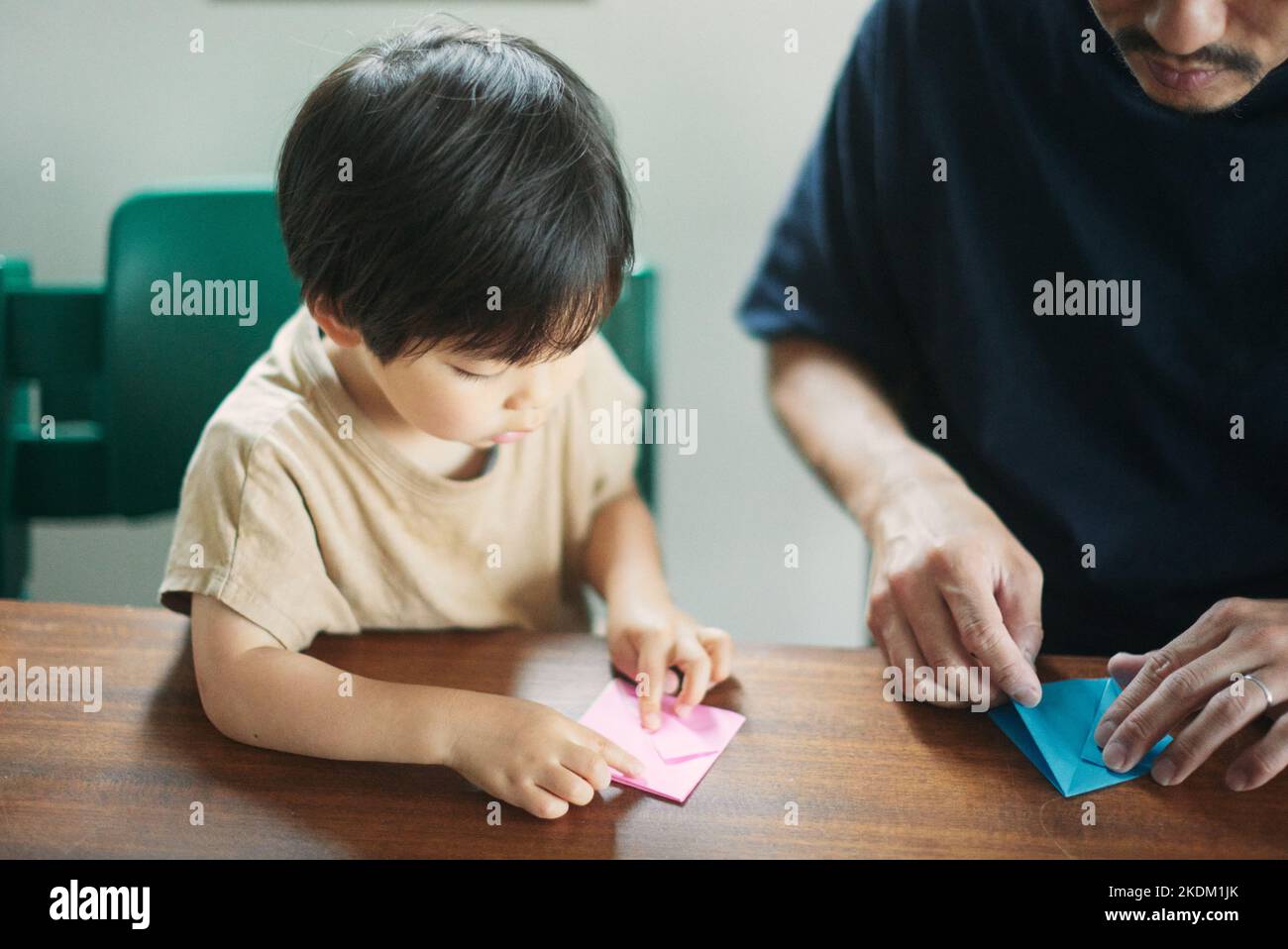 Japanese kid playing with his dad at home Stock Photo - Alamy