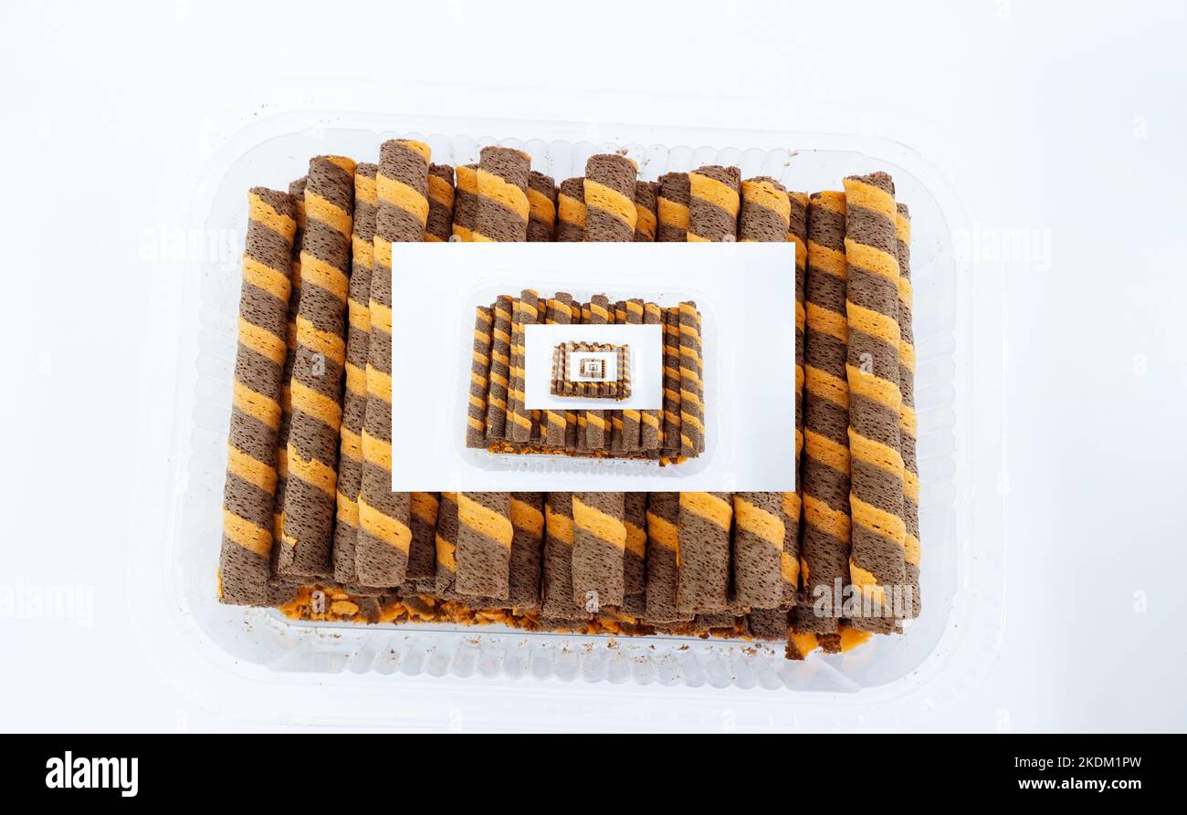 Round wafers sticks orange taste with chocolate stuffing isolated on ...