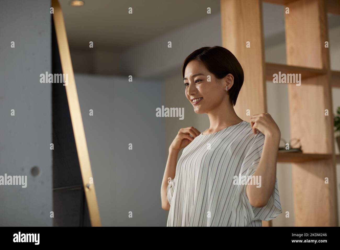 Japanese woman getting ready at home Stock Photo - Alamy