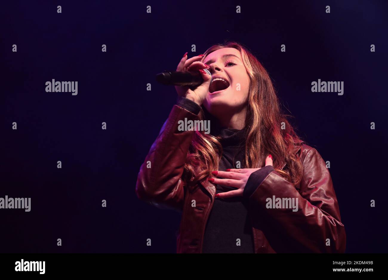 In the picture: Unknown singer on stage during the celebration. Earlier ...