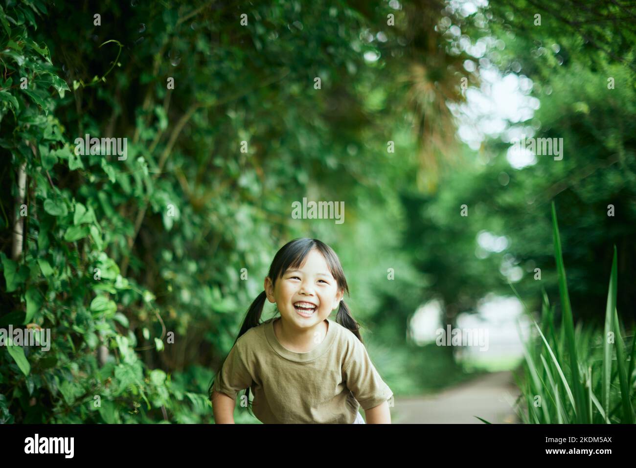 Japanese kid at city park Stock Photo - Alamy