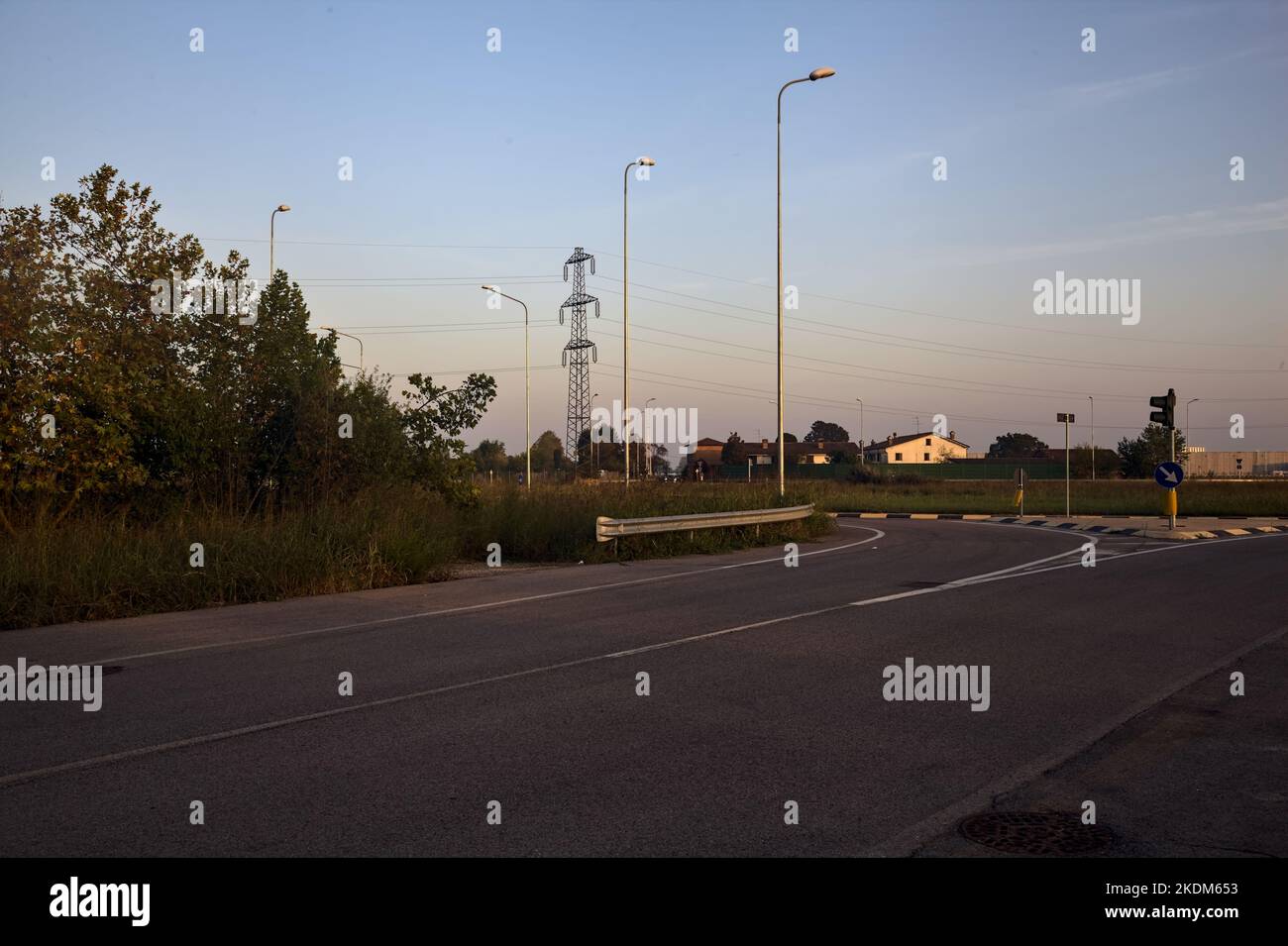 Fork between two lanes in a roundabout in the italian countryside at ...