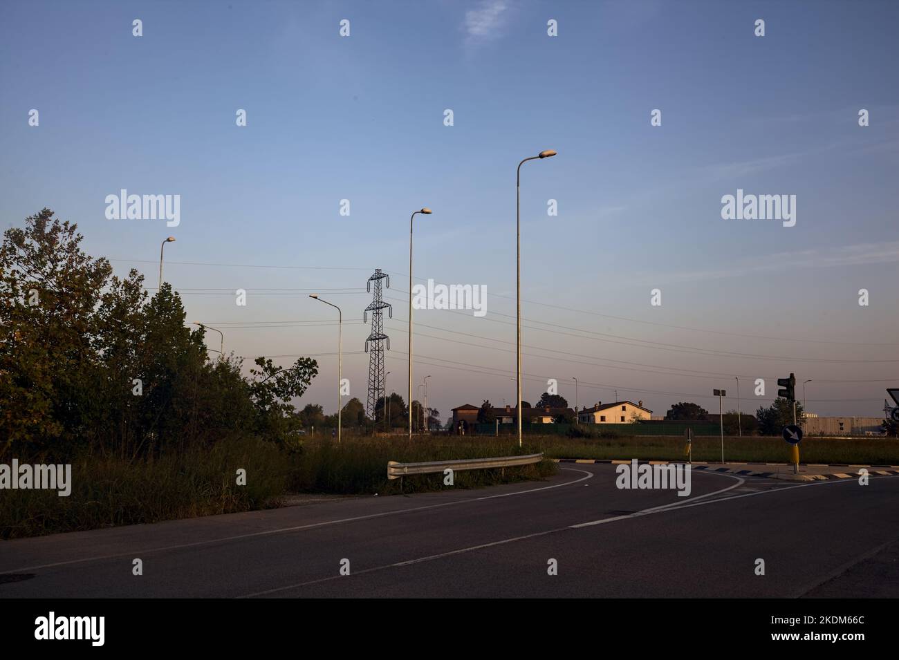 Fork between two lanes in a roundabout in the italian countryside at ...