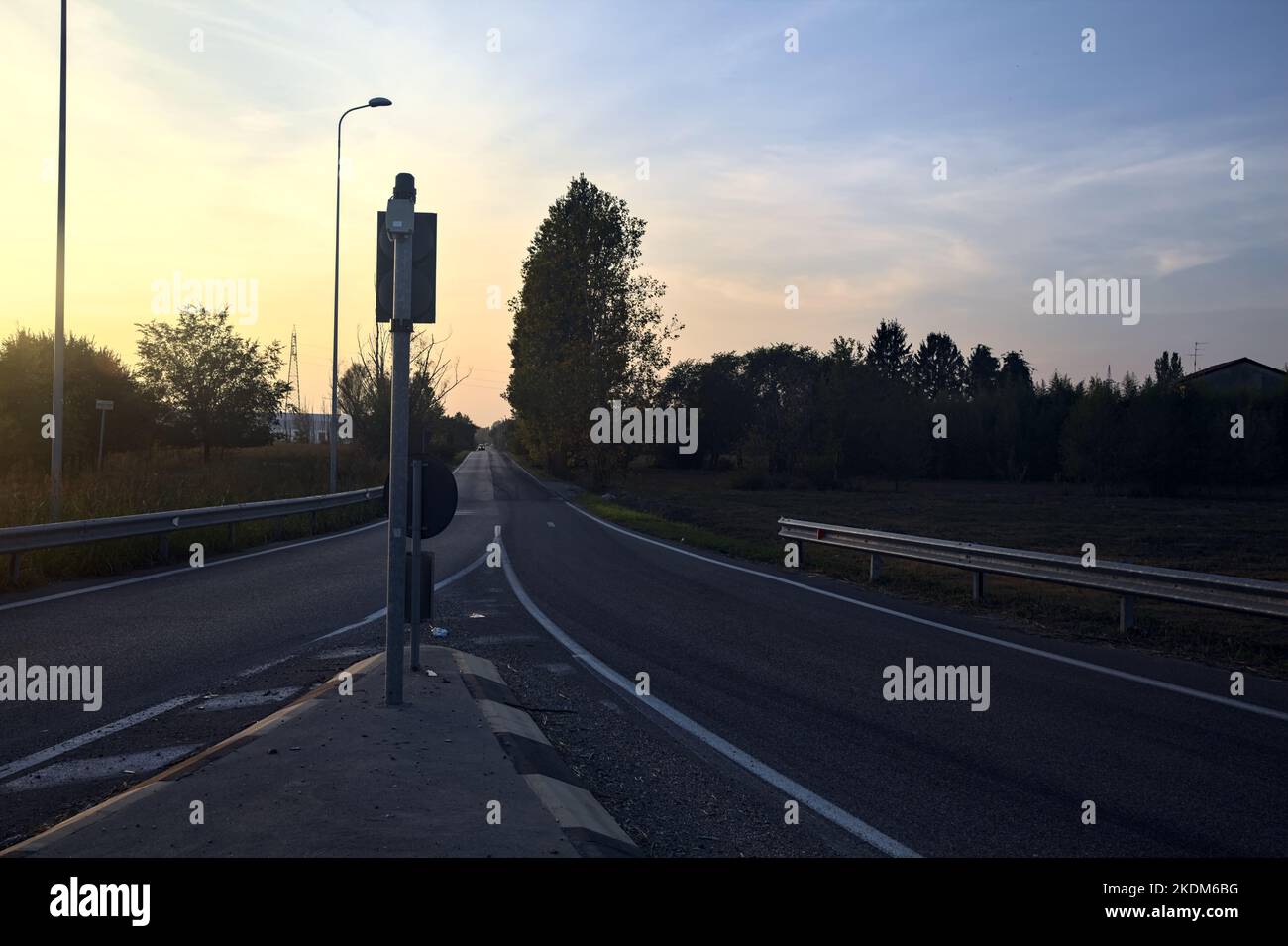 Fork between two lanes in a roundabout in the italian countryside at ...