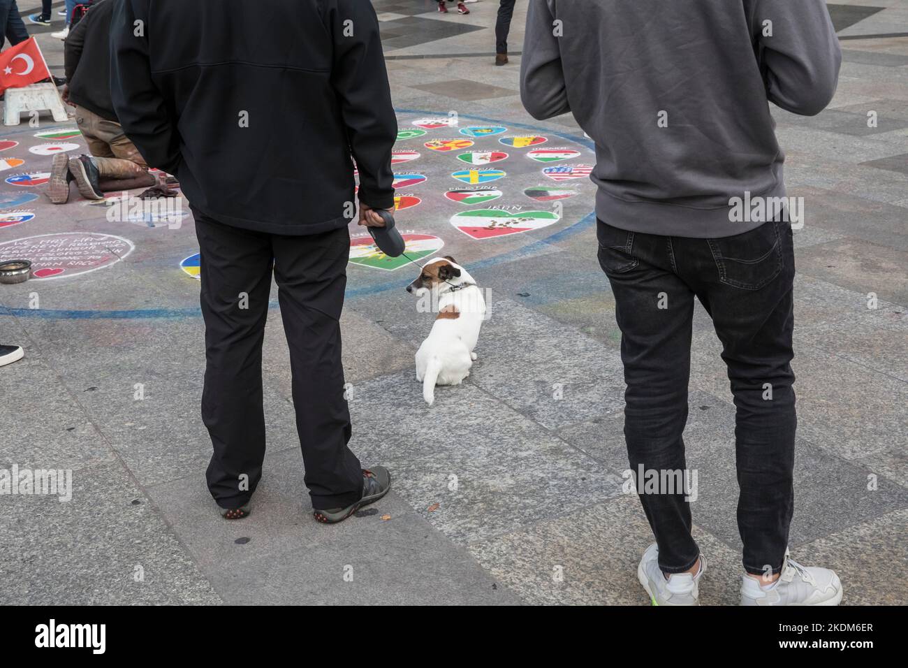 painting of a pavement painter in front of the cathedral, flags of ...