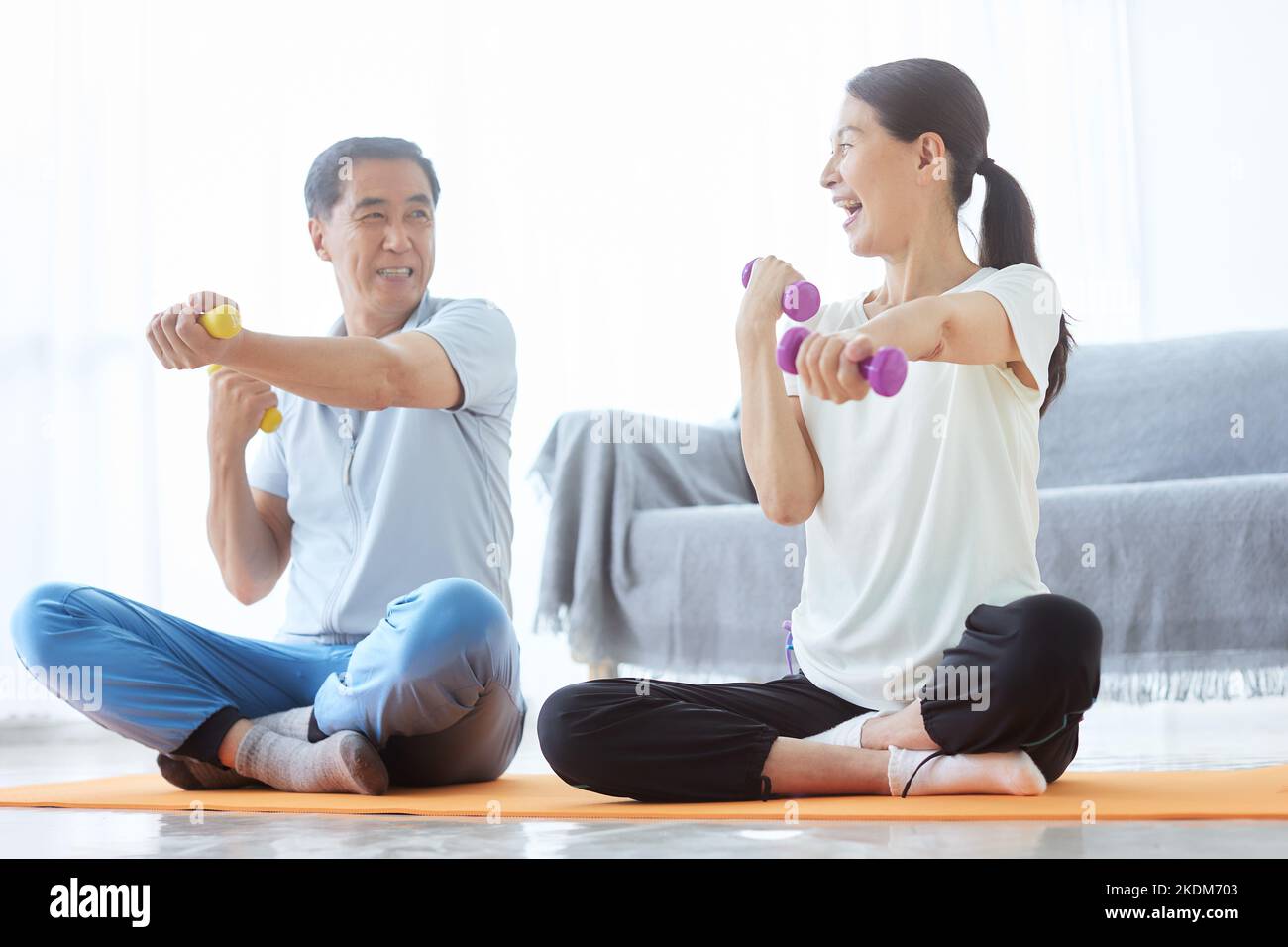 Japanese senior couple training Stock Photo - Alamy