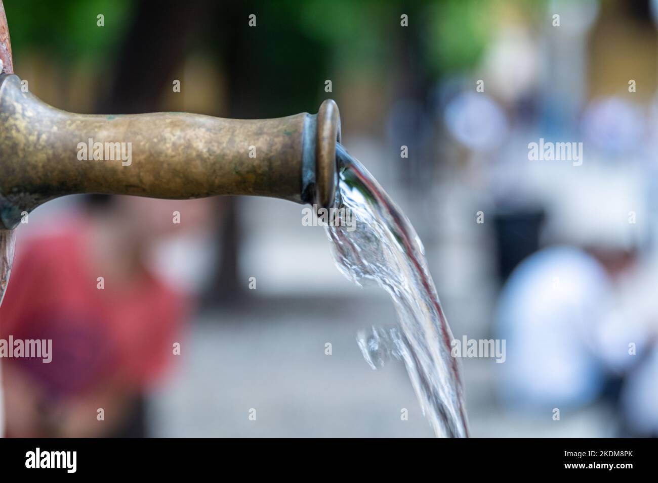 Close-up of water flowing out of a public drinking fountain Stock Photo ...
