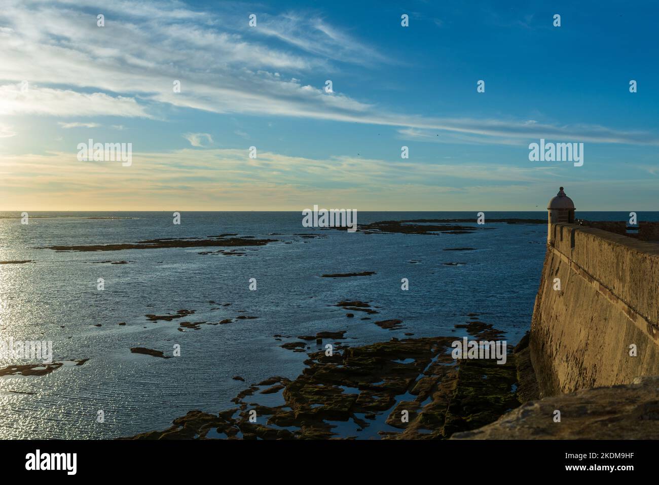 Watchtower of an ancient fortress on a coastal shore Stock Photo - Alamy