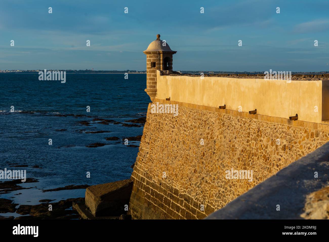 Watchtower of an ancient fortress on a coastal shore Stock Photo - Alamy