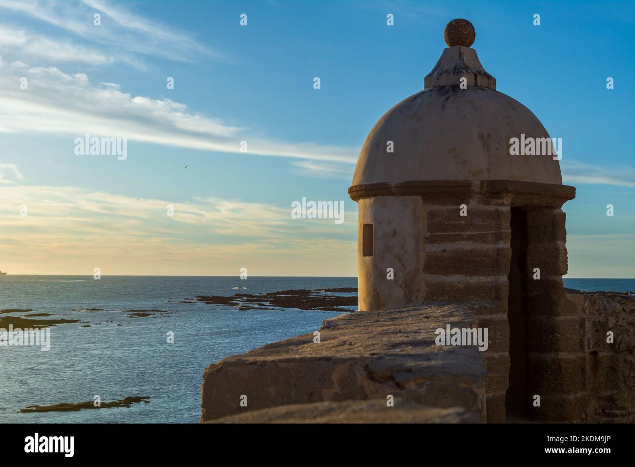 Watchtower of an ancient fortress on a coastal shore Stock Photo - Alamy