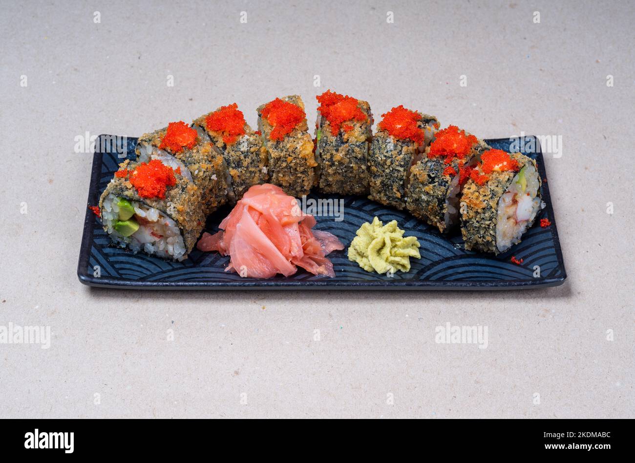 Rolls baked in tempura with red masago caviar. Japanese tasty food ...