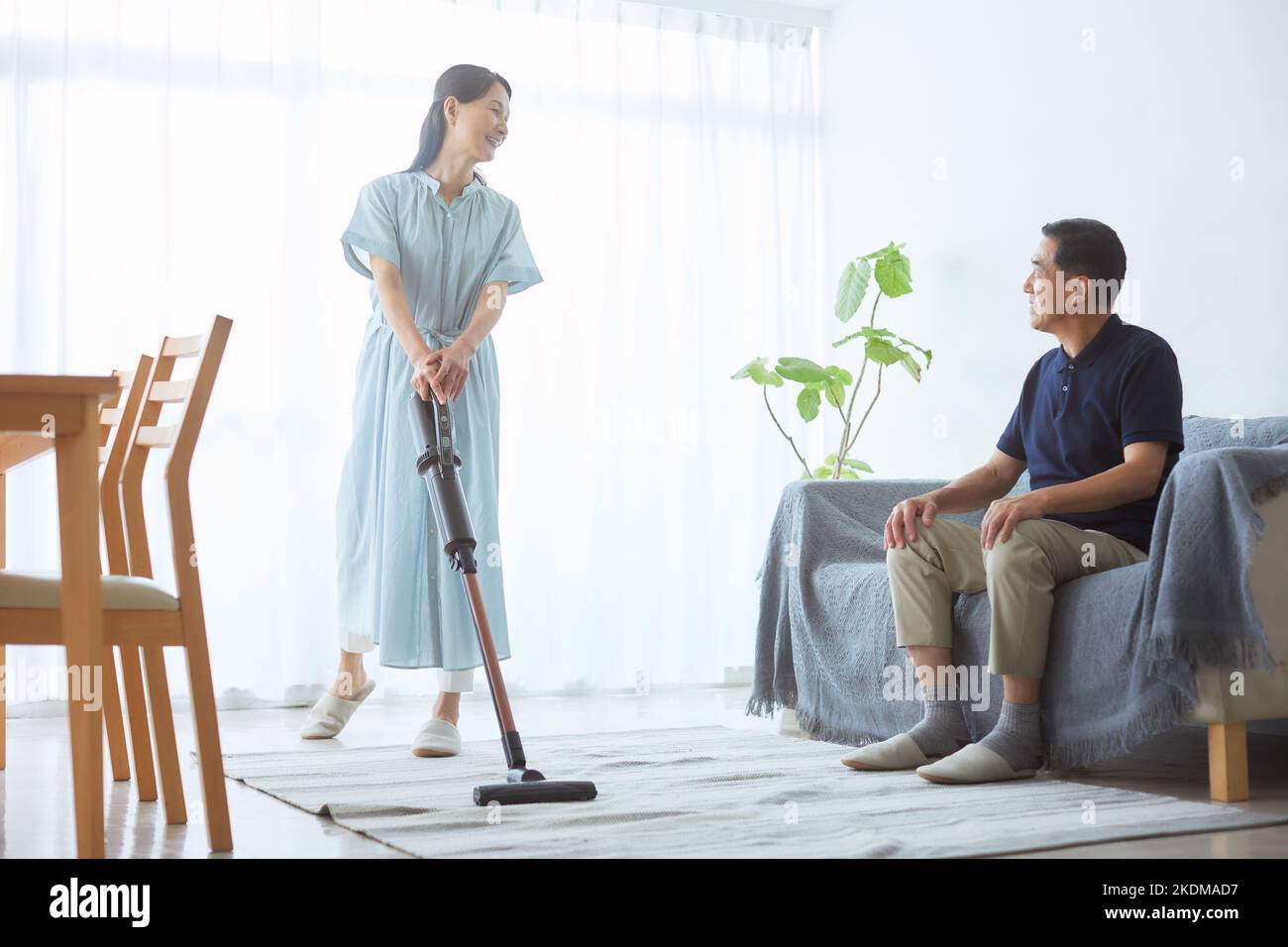 Japanese senior woman cleaning at home Stock Photo - Alamy