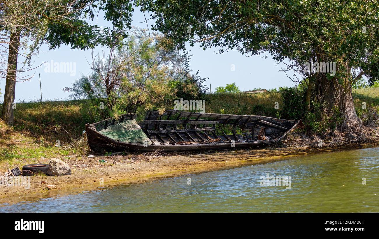 Old damaged boat in the Danube Delta Stock Photo - Alamy
