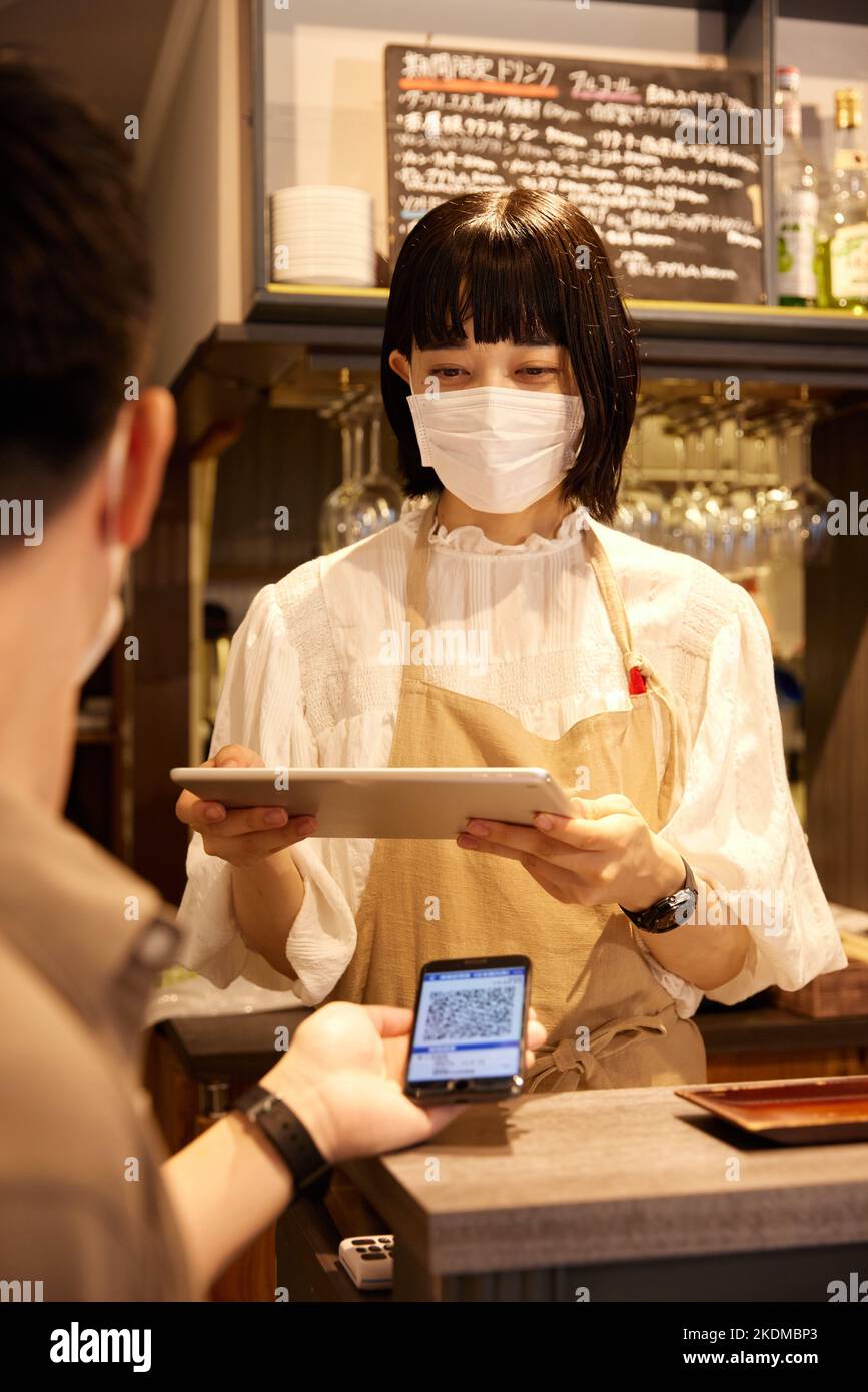 Japanese restaurant staff working Stock Photo - Alamy