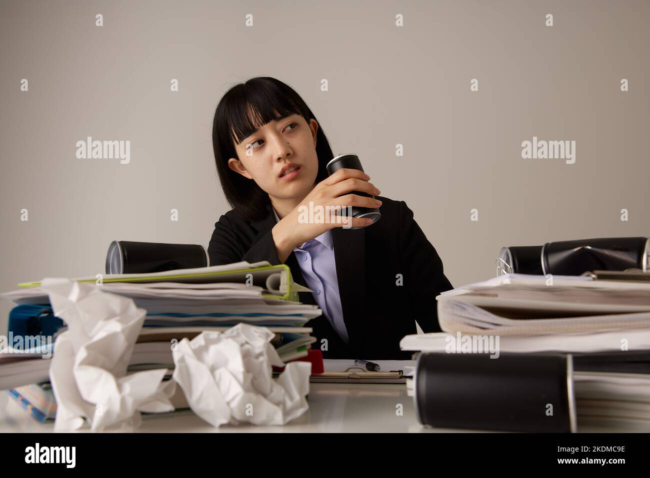 Tired Japanese businesswoman Stock Photo - Alamy