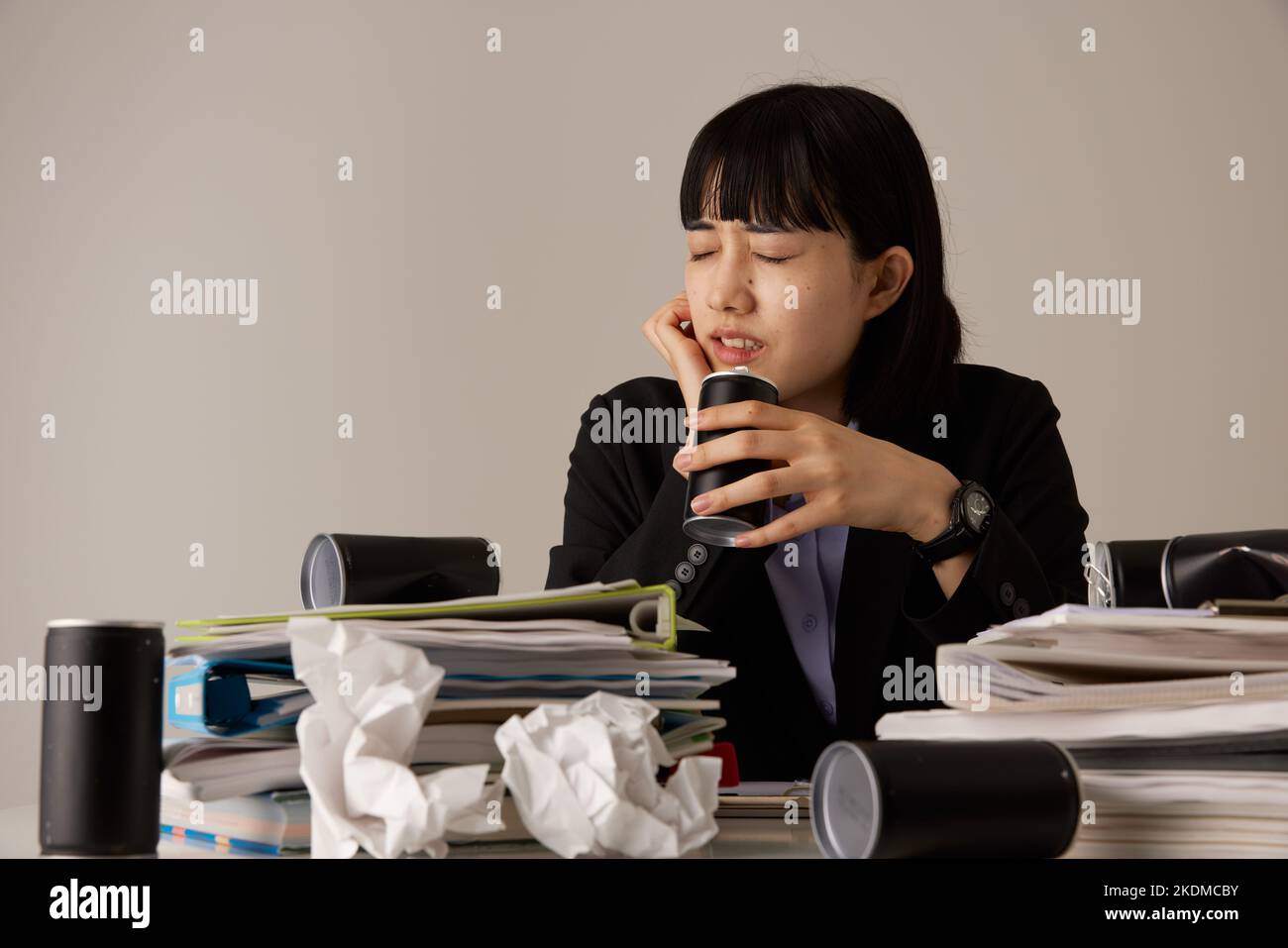 Exhausted young businesswoman sleepy hi-res stock photography and ...
